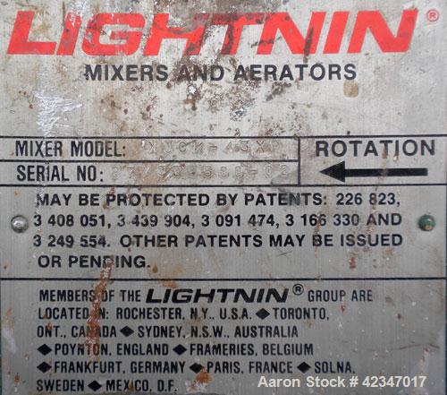 Used Lightnin Top Entering Agitator, Model XJCK-43XP. 4" diameter stu