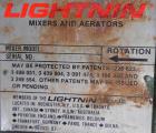 Used Lightnin Top Entering Agitator, Model XJCK-43XP. 4" diameter stu