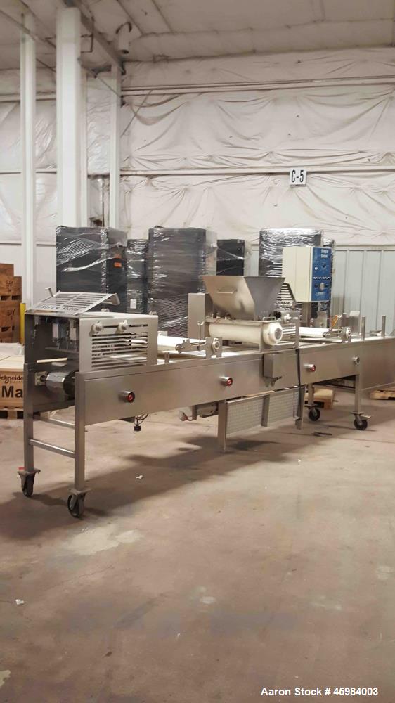 Used Simple Simon Pie Machine, Model 4700. Capable of producing pies