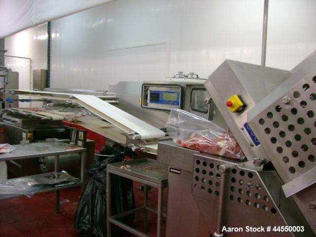 UsedComplete line for producing slices of ham and sausage. The line