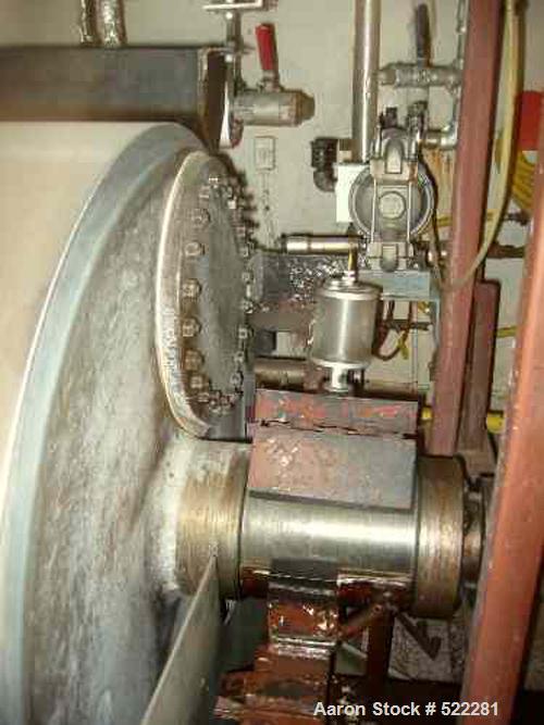 USED: Single drum flake roll. Drum is 4' diameter x 9' long. Last use