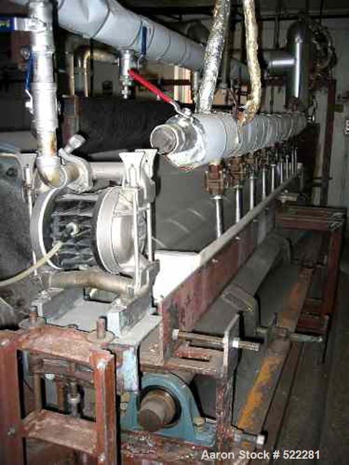USED: Single drum flake roll. Drum is 4' diameter x 9' long. Last use