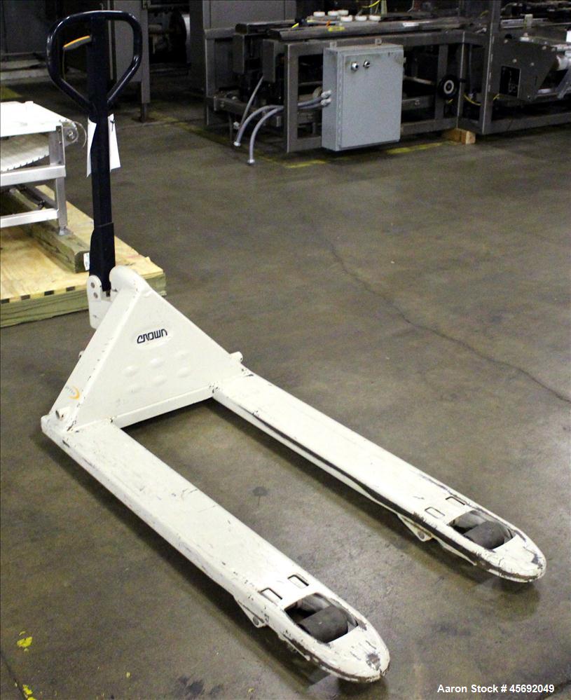 Used Crown Pallet Jack, Model PTH50. 5000 lbs capacity. Serial #7-758