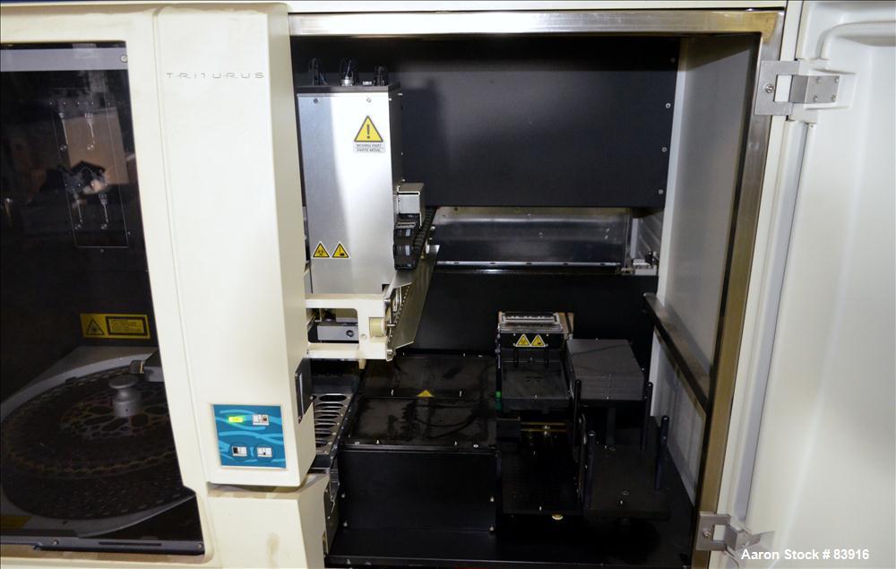 Used Grifols-Quest EIA Analyzer. The Model Triturus is an open and co