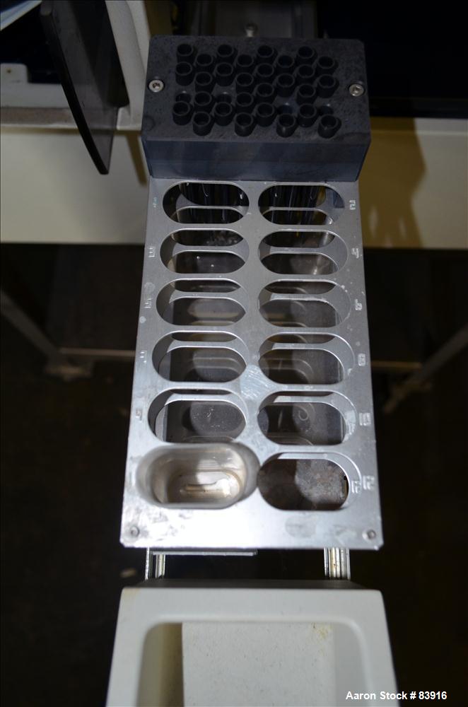 Used Grifols-Quest EIA Analyzer. The Model Triturus is an open and co