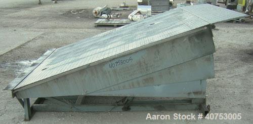 Used Serco Mechanical Dock Leveler, model W8730, carbon steel. 83" wi