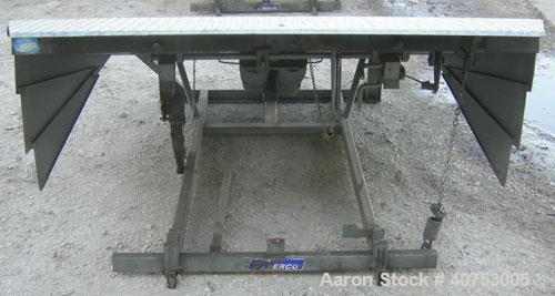 Used Serco Mechanical Dock Leveler, model W8730, carbon steel. 83" wi
