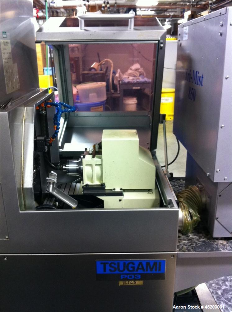 UsedTsugami PO3 CNC Precision Automatic Lathe Machine. Includes a ba