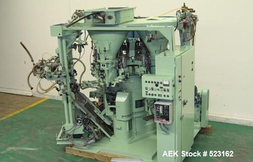Used American Newlong model 6CMPL automatic, 4 head, rotary bagfiller