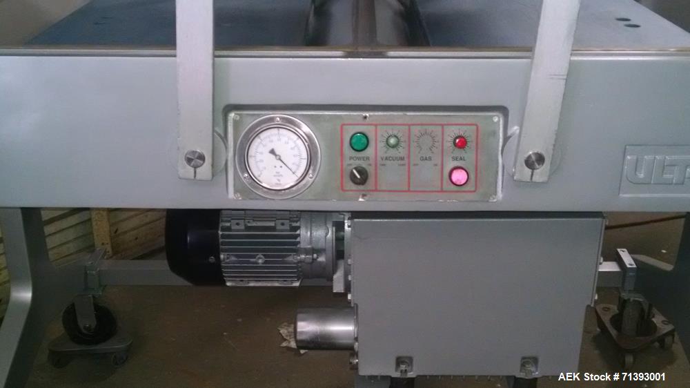 Used Ultravac 2000 Vacuum Packaging Machine. 27" seal bars, 32" inbet