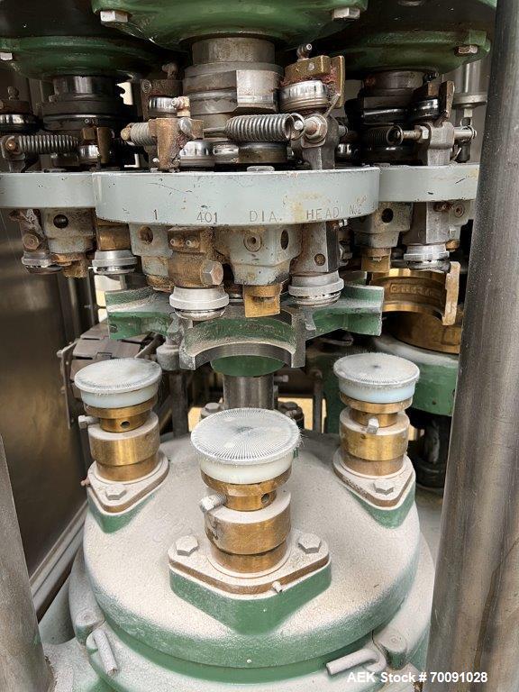 Used-Angelus Model 40P Automatic 4 Head Rotary Ca