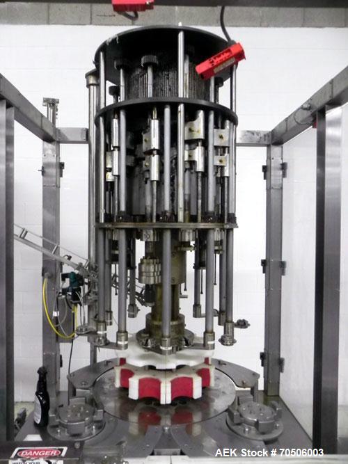 Used Pneumatic Scale Model TC-450-10 Rotary Capper. Machine is capabl