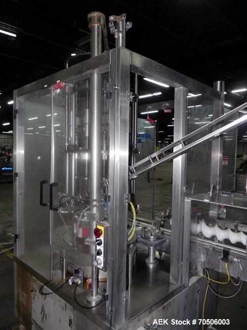 Used Pneumatic Scale Model TC-450-10 Rotary Capper. Machine is capabl