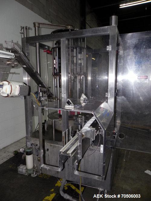 Used Pneumatic Scale Model TC-450-10 Rotary Capper. Machine is capabl