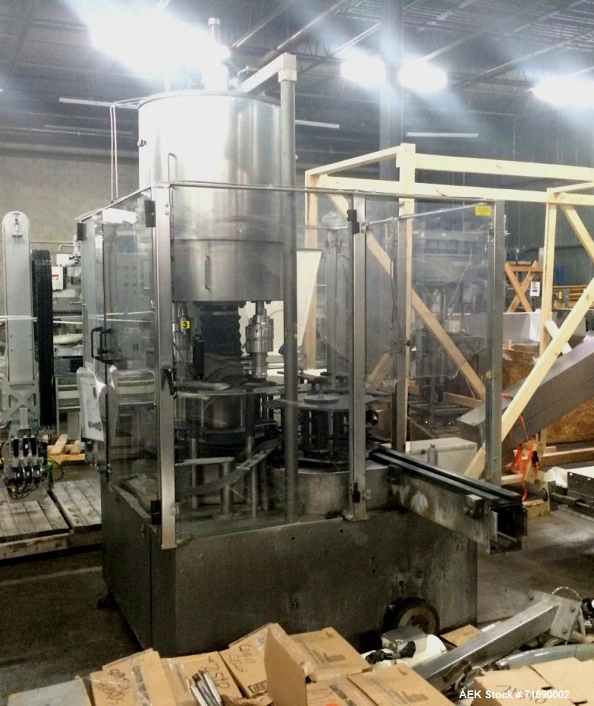 Used US Bottlers Rotary Capper. 6 heads, last used on gallon F styl