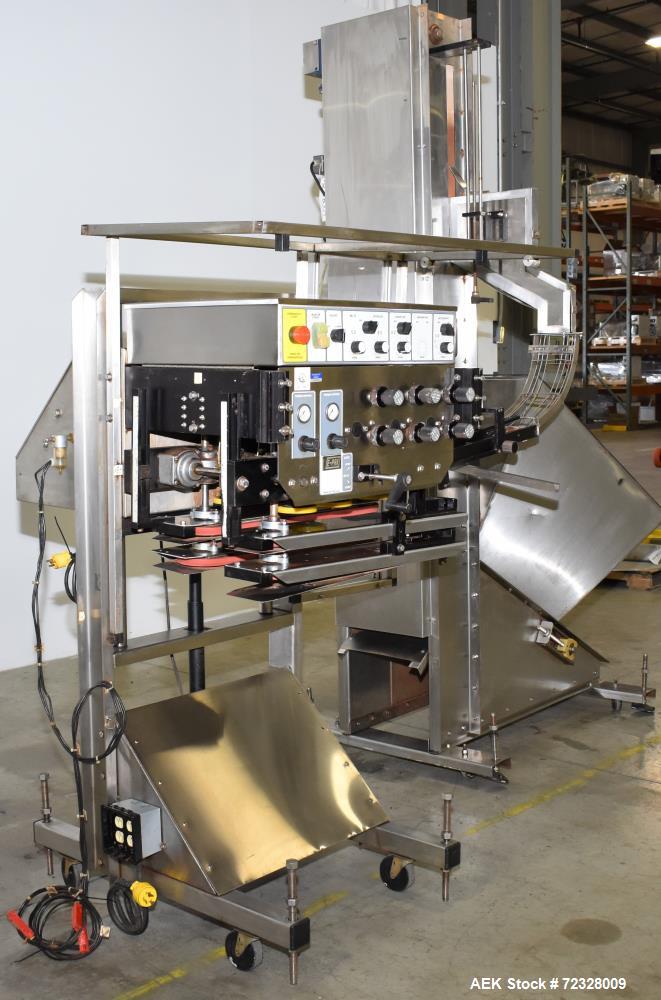 Used E-Pak Automatic Inline Quill Capper with Integrated Cap Elevator