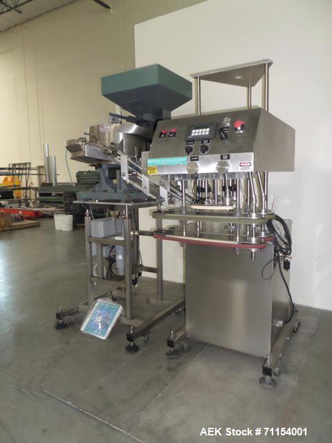 Used Inline Filling Systems Capper. 110V, 60 cycle. Includes hopper