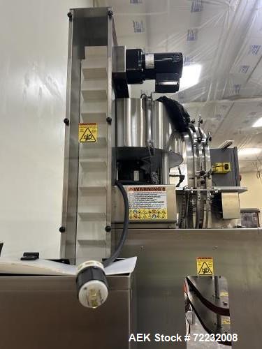 Used KapsAll Model A-6 Automatic Quill Capper. Six spindle with doubl