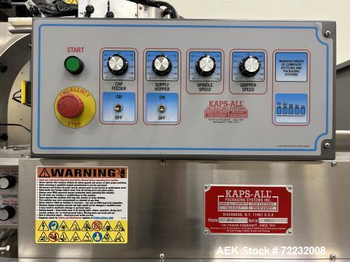 Used KapsAll Model A-6 Automatic Quill Capper. Six spindle with doubl