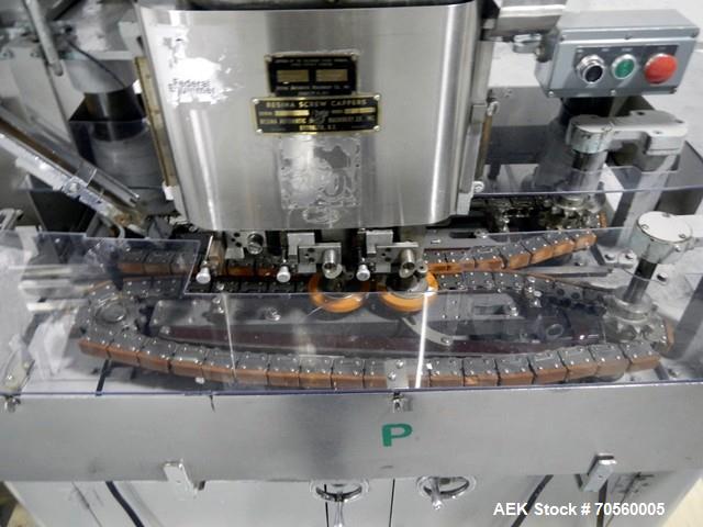 Used Resina U30 Inline Quill Capper. Capable of speeds up to 120 cpm.