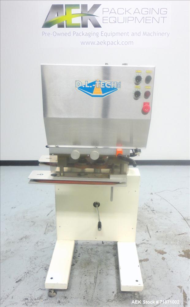 Used D.L.Tech (Aesus) Model DLCAP-2E Cap Retorquer. Machine is capabl