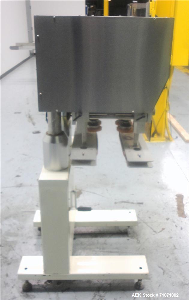 Used D.L.Tech (Aesus) Model DLCAP-2E Cap Retorquer. Machine is capabl