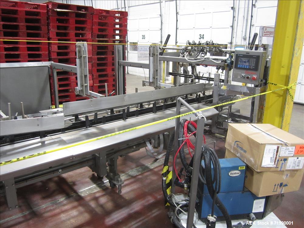Used Langen B1M Semi-Automatic Horizontal Cartoner. 18" center machin