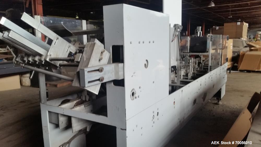 Used Tanney Cartoner, Model 902 EC. Load Area 68", Pitch 12". Missing