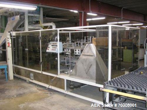 Used: Triangle Model VCL-1500 Continuos Motion Vertical Cartoner. Mac