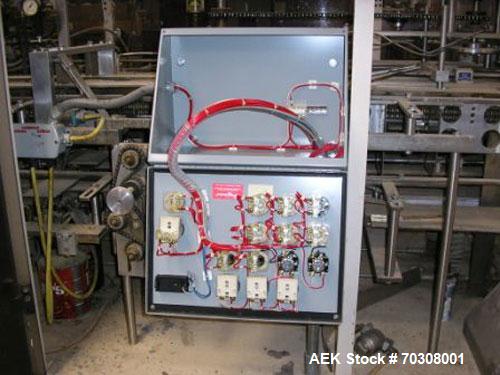 Used: Triangle Model VCL-1500 Continuos Motion Vertical Cartoner. Mac