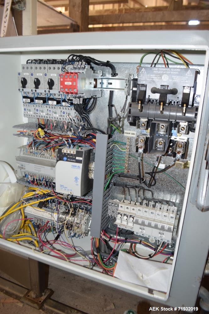 Used Combi Packaging Systems 3CE Case Erector. Includes a control pan