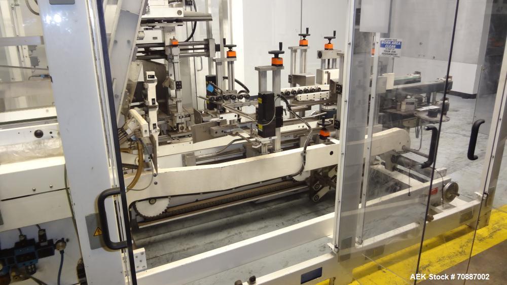 Used Focke Model 486 Automatic Case Erector, Side Load Packer, and Ta