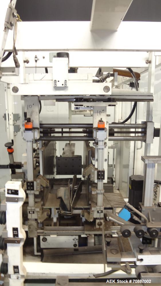 Used Focke Model 486 Automatic Case Erector, Side Load Packer, and Ta