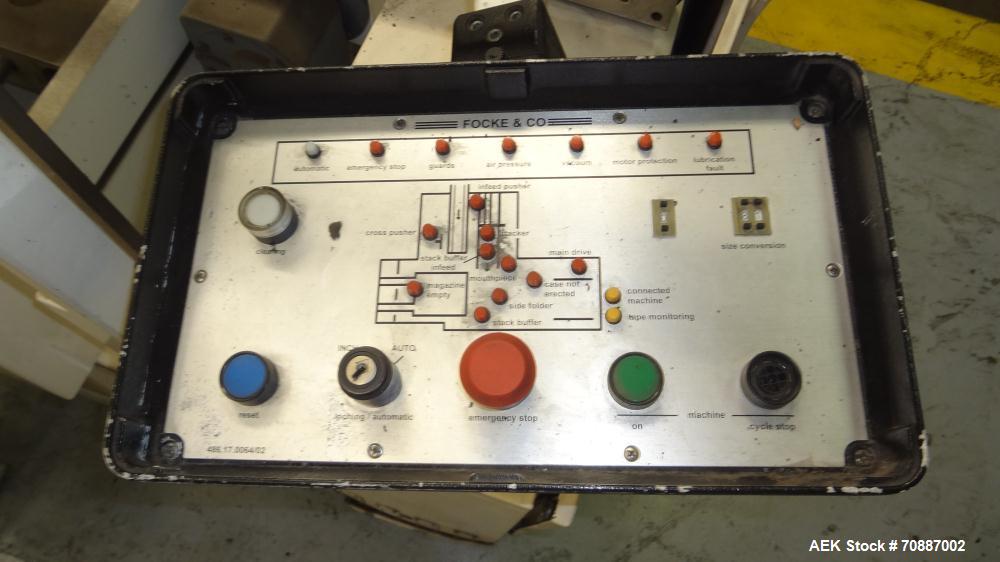 Used Focke Model 486 Automatic Case Erector, Side Load Packer, and Ta