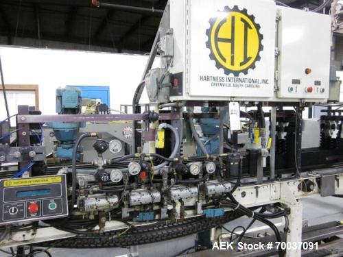 Used Hartness, Case Packer with Infeed Laner, Model 825. Lowering hea