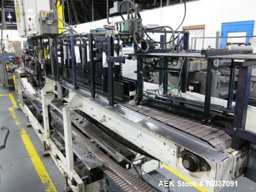 Used Hartness, Case Packer with Infeed Laner, Model 825. Lowering hea