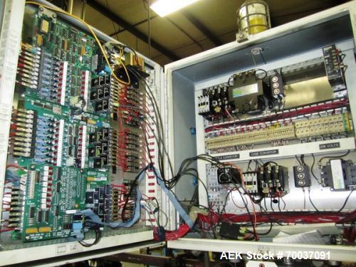 Used Hartness, Case Packer with Infeed Laner, Model 825. Lowering hea