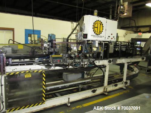 Used Hartness, Case Packer with Infeed Laner, Model 825. Lowering hea
