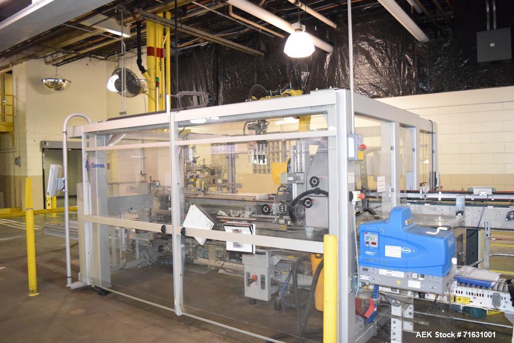 Used Cermex Model SD68.60 Case Erector. Equipped with a Nordson Pro