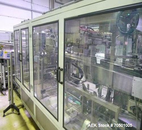 UsedInvolvo Type PTF28MG Case Packer. Maximum capacity 24,000 bottle