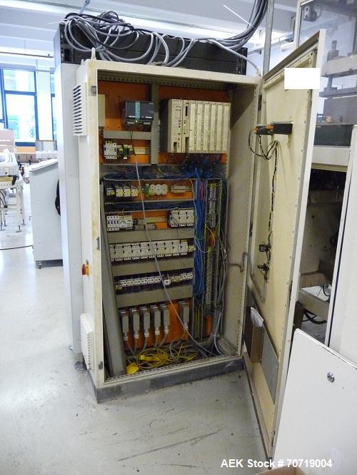 Used Transnova Case Packer, Model V-760. Capacity 8.5 cartons per min