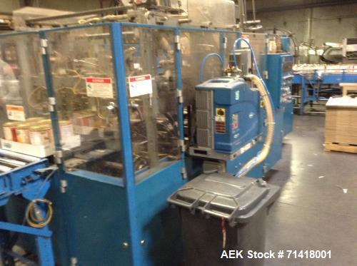 Used Douglas Case Packer, Model M-2449. 28-30 cases per minute, 25 oz