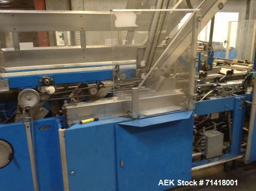 Used Douglas Case Packer, Model M-2449. 28-30 cases per minute, 25 oz