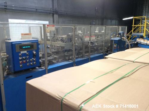 Used Douglas Case Packer, Model M-2449. 28-30 cases per minute, 25 oz