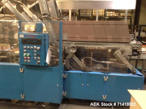 Used Douglas Case Packer, Model M-3409. 28-30 cases per minute, 128 o