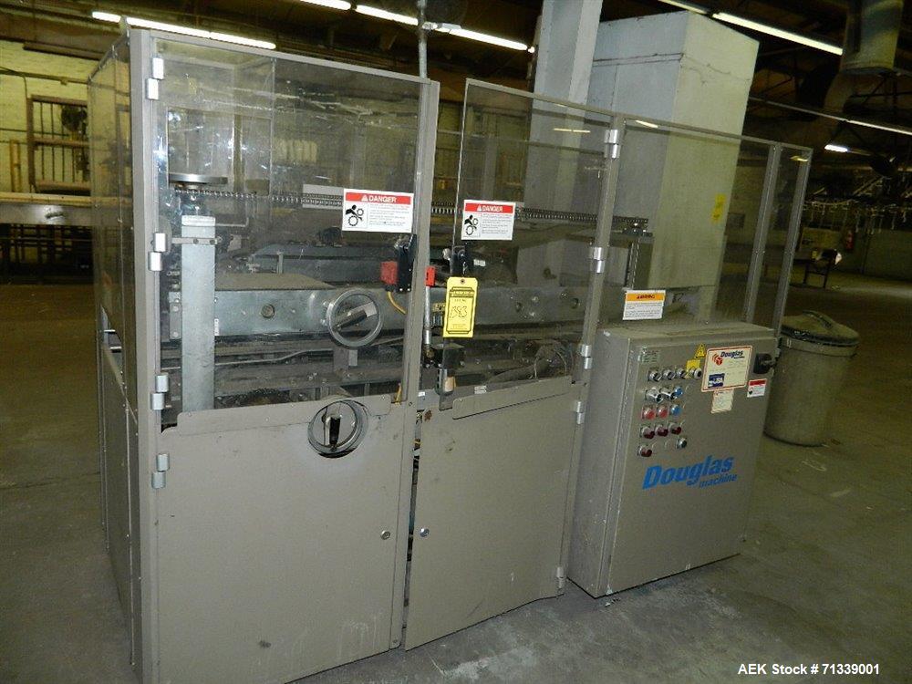 Used Douglas Model CES FOL Flap Style Case End Sealer. Machine is cap