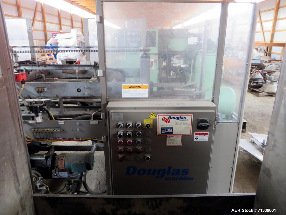 Used Douglas Model CES FOL Flap Style Case End Sealer. Machine is cap