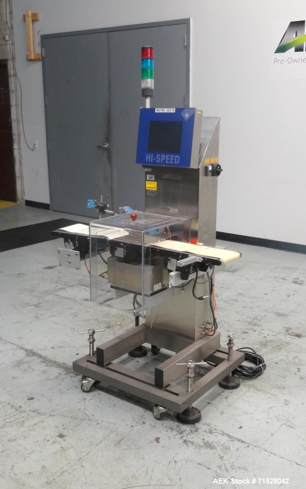 Used Garvens RX2 Belt Checkweigher. Capable of speeds up to 400 ppm.