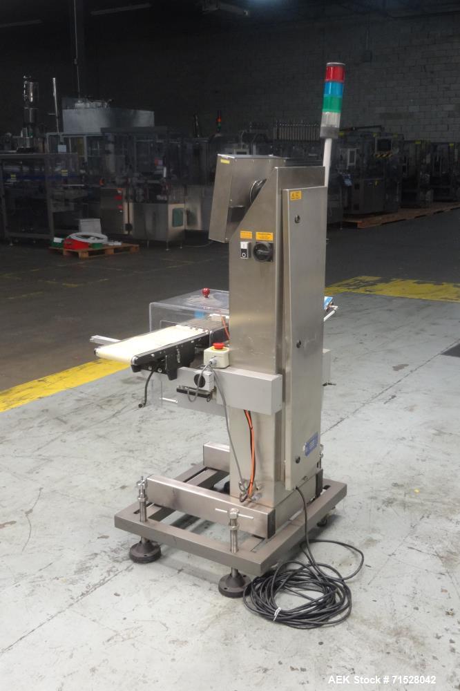 Used Garvens RX2 Belt Checkweigher. Capable of speeds up to 400 ppm.