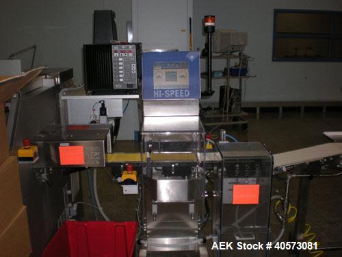 Used: Garvens RX2 belt checkweigher capable of speeds up to 400 ppm.